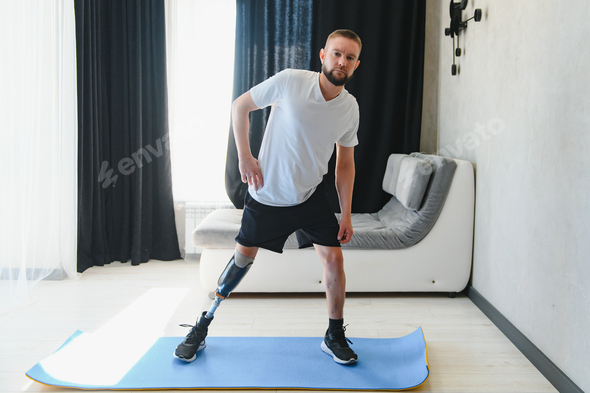 Man amputee with prosthetic leg disability on transfemoral leg ...