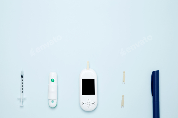 Diabetes concept with glucometer, syringe pen with insulin, blood test ...