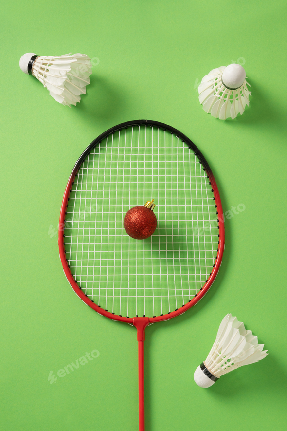 Christmas concept. badminton racket and white feather shuttlecock. Xmas ...