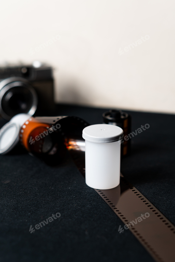 Vintage Camera with Film Roll and Canister Stock Photo by Wdnld | PhotoDune