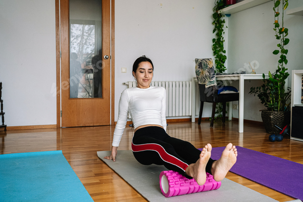 Foam Rolling Exercise for Leg Muscles Stock Photo by guillemd | PhotoDune