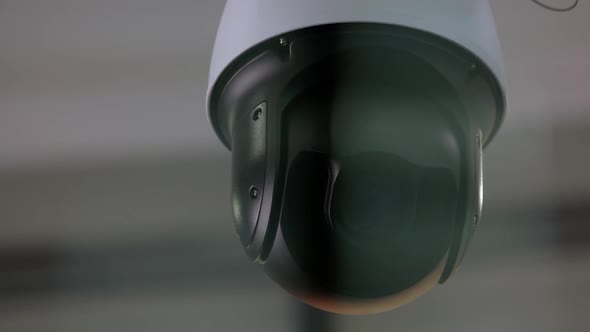 Closeup of Rotating Surveillance Security Video Camera, Stock Footage