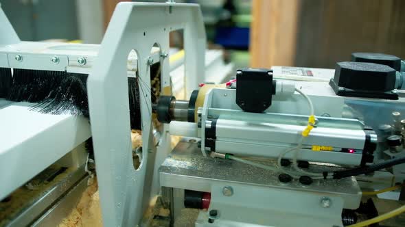 Industry for making doors. Modern automated machine doing holes in ...