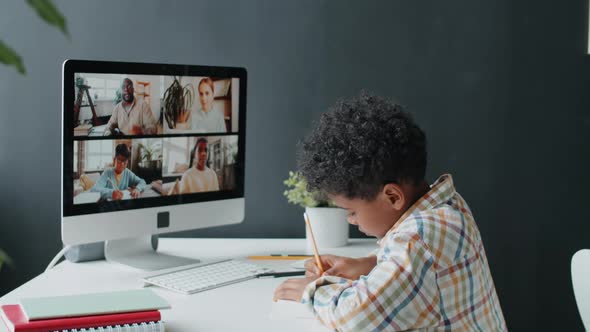 Afro-American Boy Taking Online Class at Home, Stock Footage | VideoHive