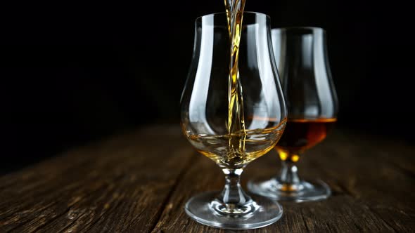 Super Slow Motion Shot of Pouring Rum Into Glass at 1000Fps with Camera ...