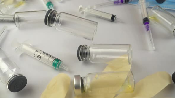 Syringes and falling ampoules. Slow motion., Stock Footage | VideoHive
