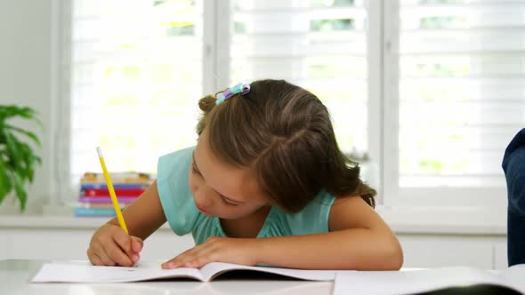 Two children doing homework together, Stock Footage | VideoHive