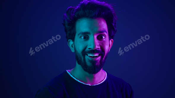 Portrait Indian man standing in profile side view turn to camera ...