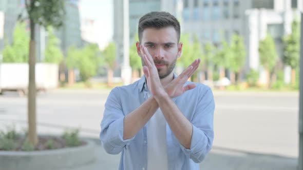 Outdoor Portrait of Rejecting Young Man Doing No Gesture, Stock Footage