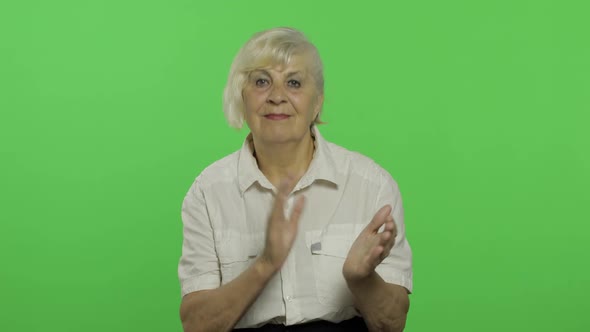 An Elderly Woman Clapping in Hands. Old Pretty Grandmother. Chroma Key ...