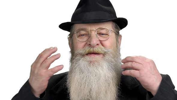 Close Up Senior Man is Preening on White Background, Stock Footage