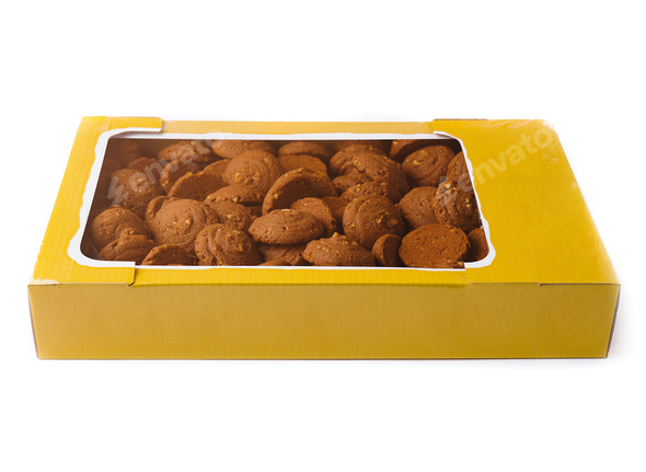Cardboard box full of chocolate chip cookies isolated on white ...