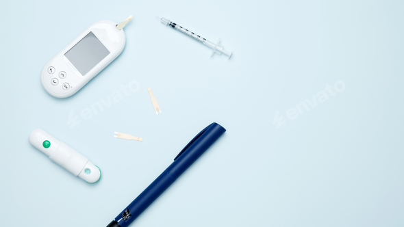 Diabetes concept with glucometer, syringe pen with insulin, blood test ...