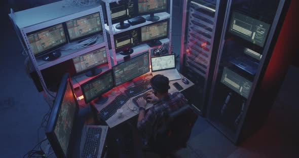 Hacker Using Computer with Multiple Monitors, Stock Footage | VideoHive