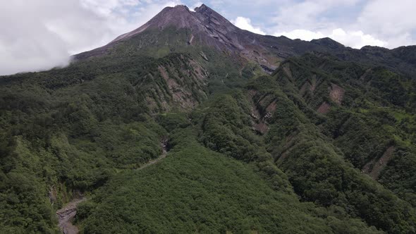 Aerial view of active Merapi mountain with clear sky in Indonesia ...