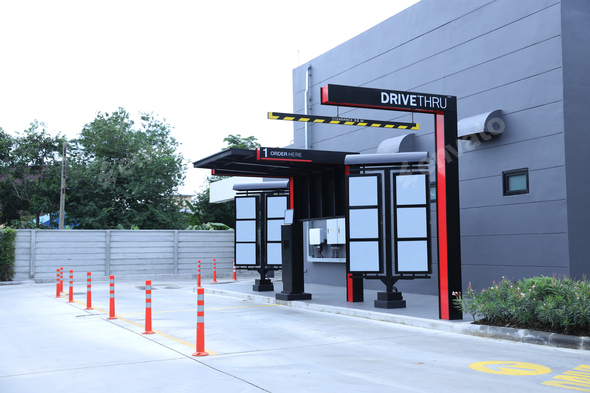 Drive thru sign in fast food restaurant. Drive thru sign into the shop ...