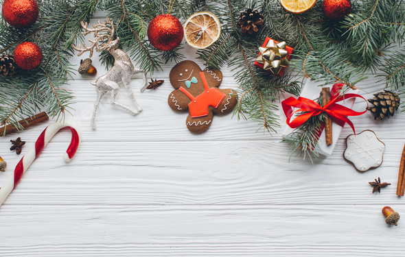 Christmas composition. Gifts, pine cones, fir branches, candy ...