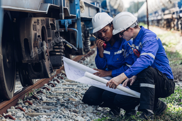 Engineer inspection and checking railway and checking work on railroad ...