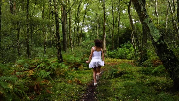 Girl Running Through Forest, Stock Footage | VideoHive
