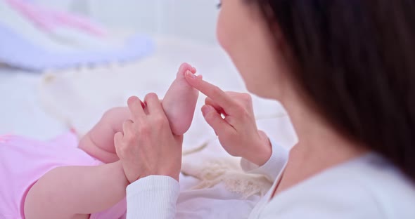Closeup Legs of a Newborn Baby Baby Wiggles His Fingers, Stock Footage