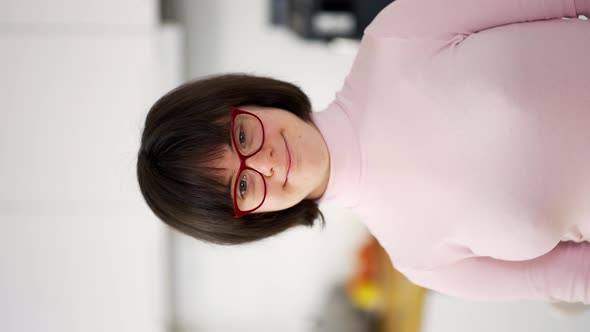 Portrait of Kid with Special Needs Smiling at Camera at Home, Stock Footage