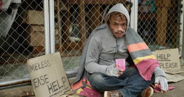 Homeless drinking water, Stock Footage | VideoHive