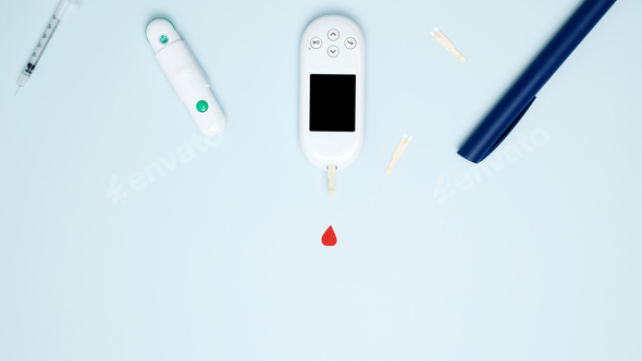 Diabetes concept with glucometer, syringe pen with insulin, blood test ...