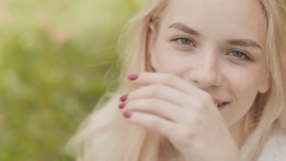 Closeup Face Of A Smiling 19 Year Old Blonde Girl Stock Footage