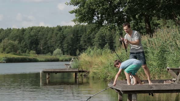 Fisherman with Fishing Rod Fighting the Fish, Stock Footage | VideoHive