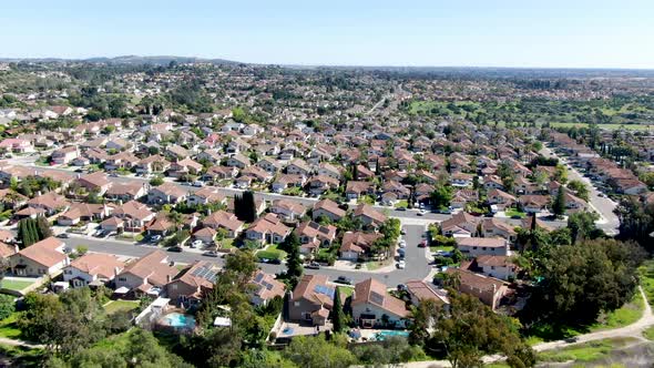 Aerial View of Upper Middle Class Neighborhood in the Valley with Blue ...