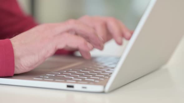 Hands of Old Man Typing on Laptop, Stock Footage | VideoHive