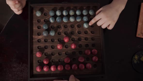 Board Game with Red and Blue Balls on the Playing Field, Stock Footage