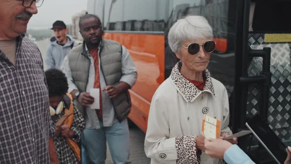 Bus Conductor Scanning Tickets of Passengers, Stock Footage | VideoHive