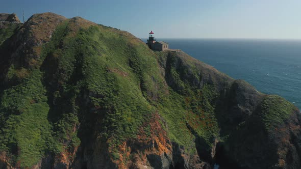 Aerial Close Up Overlook of the Historical Building of Lighthouse with ...
