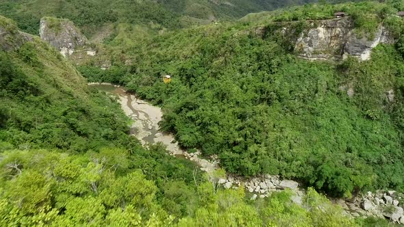 Aerial view of cable car above Inabanga river in Danao, Philippines ...