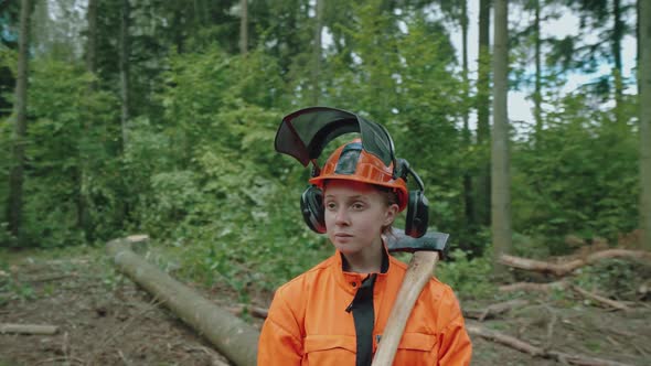 Portrait of a Female Logger Standing in the Forest a Young Specialist ...