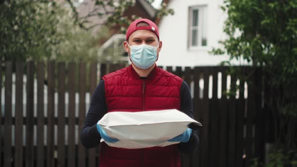 Delivery Concept Portrait of Happy Spanish Delivery Man with Face Mask ...