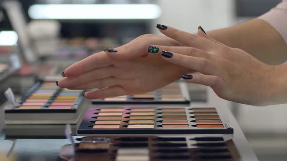 Professional Cosmetic, Arm of Customer Girl Chooses Eyeshadow From ...