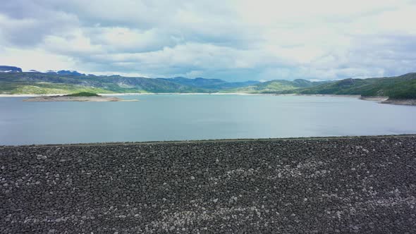 Massive water magazine Sysen-dam in Hardangervidda Norway - Aerial ...