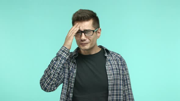 Frustrated and Disappointed Brunette Man in Glasses Staring at ...