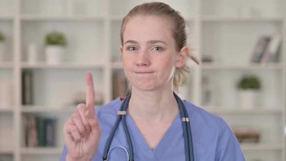 Serious Young Female Doctor Saying No By Finger Sign, Stock Footage