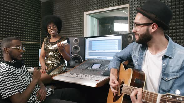 People Playing Music in Recording Studio, Stock Footage | VideoHive