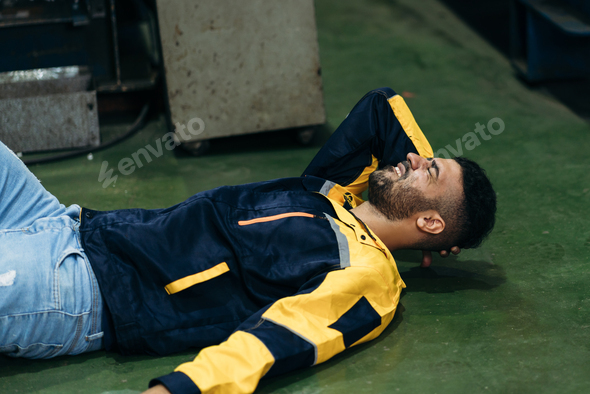 Warehouse worker sustains an injury after falling from a height while ...