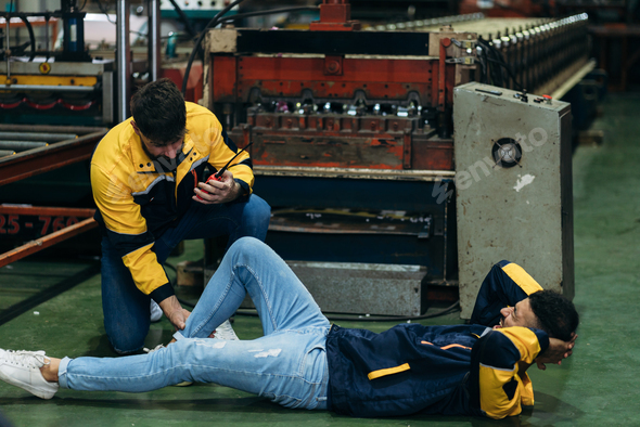 Warehouse worker sustains an injury after falling from a height while ...