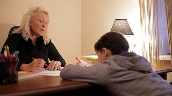 Left-Handed Schoolboy Makes The Exercises, Stock Footage | VideoHive