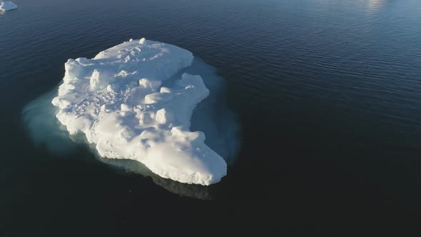 Iceberg Float in Clear Water Ocean Drone Above View, Stock Footage