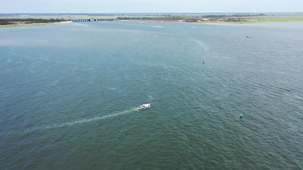 An aerial drone view over Jones Inlet on a sunny day. The camera truck ...