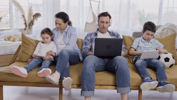 Modern Family with Kids Busy on Gadgets at Home, Stock Footage | VideoHive