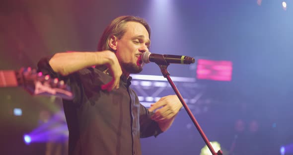 Expressive Singer Singing Into Microphone, Stock Footage | VideoHive