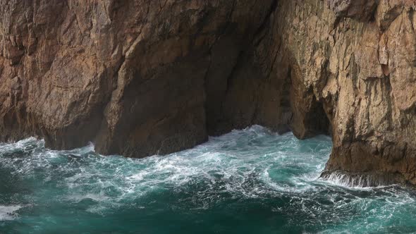 Sea Waves Enter a Cave in Rock and Form Splashes, Stock Footage | VideoHive